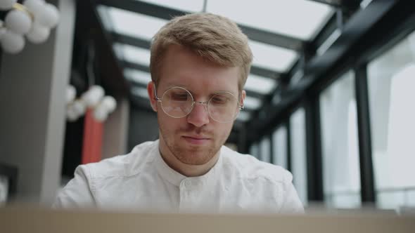 Programmer or Professional IT Specialist is Working Alone in Office ...