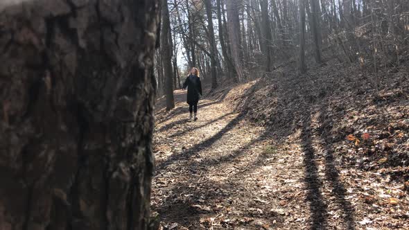 Alone woman being stalked in the forest 4K 2160p 30fps UltraHD footage ...