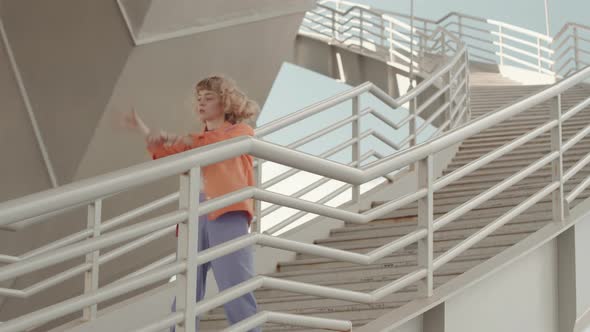 Y2K Girl Dancing Contemporary Freestyle on Stairs Outdoors, Stock Footage