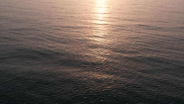 Fly over ocean, sea on sunrise. Close to the water, Stock Footage ...