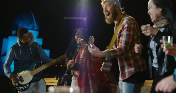 Female Singer Singing on a Rooftop, Stock Footage | VideoHive