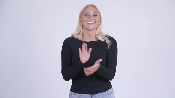 Young Happy Blonde Woman Clapping Hands, Stock Footage | VideoHive