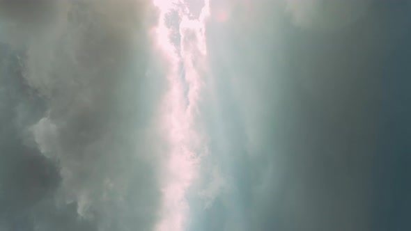 Sunrays Sunray Shine Through Dark Clouds In Cloudy Blue Sky, Stock Footage