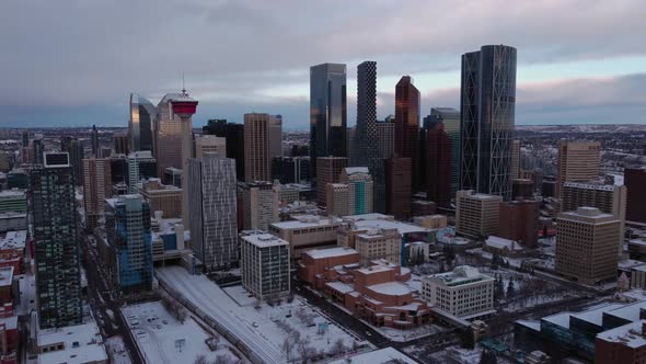 City downtown Calgary skyscrapers space needle winter snow approaching ...