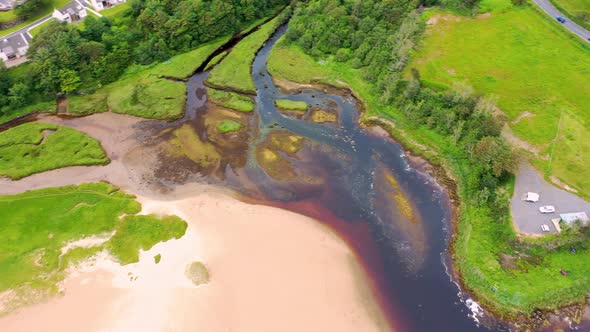 Aerial of the Mouth of the Fintragh River at Fintra Beach By Killybegs ...