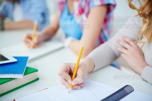Writing lecture Stock Photo by Pressmaster | PhotoDune