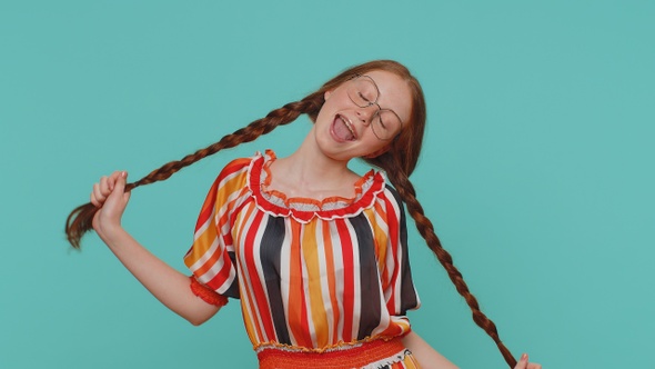 Funny Ginger Girl Making Playful Silly Facial Expressions Grimacing ...