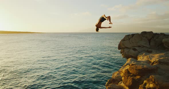 Backflip Cliff Jumping into the Ocean, Stock Footage | VideoHive