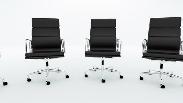 Seamless rotary animation with black office chairs stacked around ...