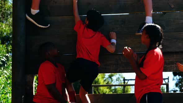 Trainer training kids in the boot camp, Stock Footage | VideoHive