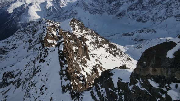 Aerial View of Cheget Mountain Range in Snow in Winter in Sunny Clear ...