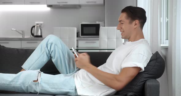 Happy Young Man Receiving Good News, Stock Footage | VideoHive