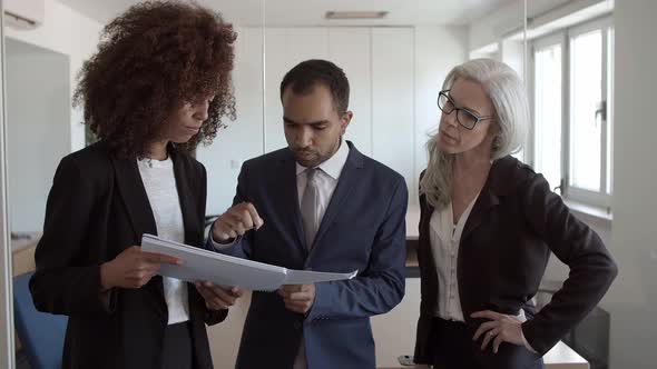 Team Leader Checking Managers Report, Stock Footage | VideoHive