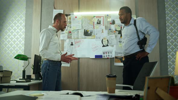 Diverse Detectives Discussing a Hard Investigation, Stock Footage ...