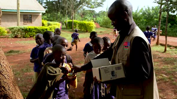 Distributing Sweets to Children, Stock Footage | VideoHive