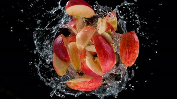 Super Slow Motion Shot of Rotating Exploded Red Apple Cuts and ...