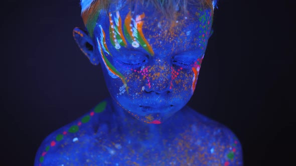 Closeup of a Small Boy's Face with an Ultraviolet Pattern on His Body ...
