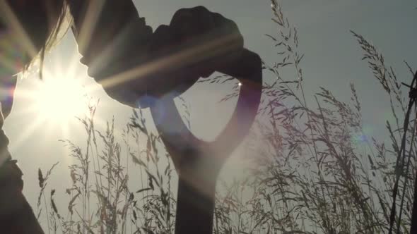 Farmer digging in hay field with fork in sunshine, Stock Footage ...