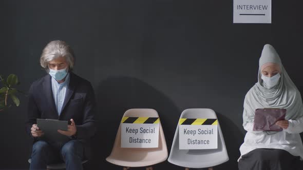 Diverse Candidates in Masks Waiting for Job Interview, Stock Footage