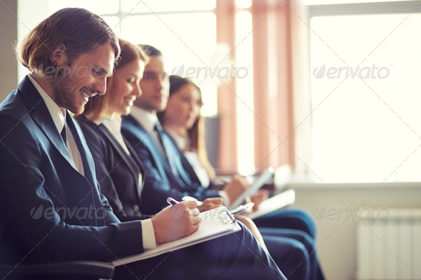 Writing lecture Stock Photo by Pressmaster | PhotoDune