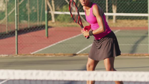 Video of focused african american female tennis player holding racket ...