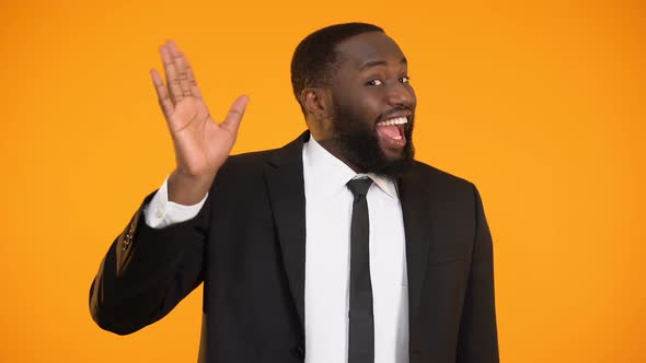 Cheerful African-American Company Representative Waving Hello Meeting ...