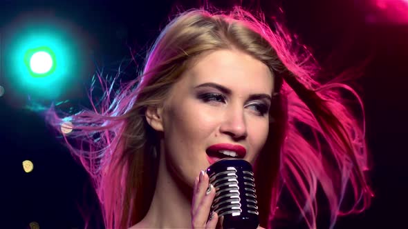 Singer Female with Retro Microphone, Long Hair Developing. Close Up ...