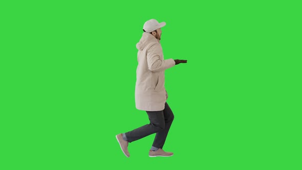 Hip-hop Man Singing Rap, Walking and Making Gestures on a Green Screen ...