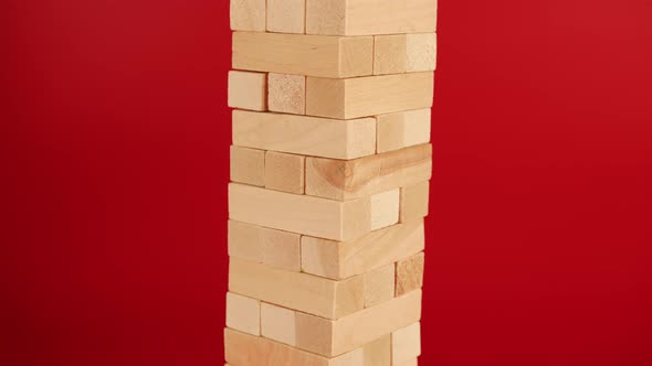 Jenga Game on Red Background, Stock Footage | VideoHive