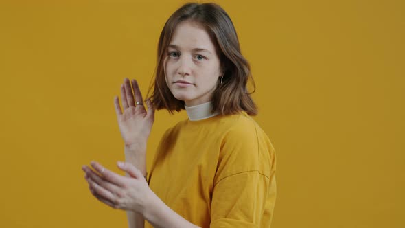 Slow Motion Portrait of Annoyed Young Woman Clapping Hands Out of ...