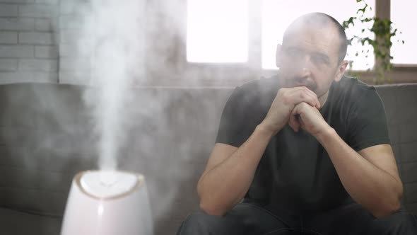 Pensive Man in Steam in Room, Stock Footage | VideoHive