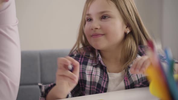 Close-up of Happy Caucasian Child Writing Down and Smiling ...