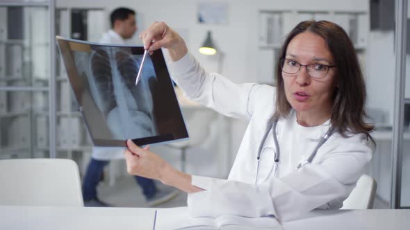 Professional Female Pulmonologist Speaking, Stock Footage | VideoHive