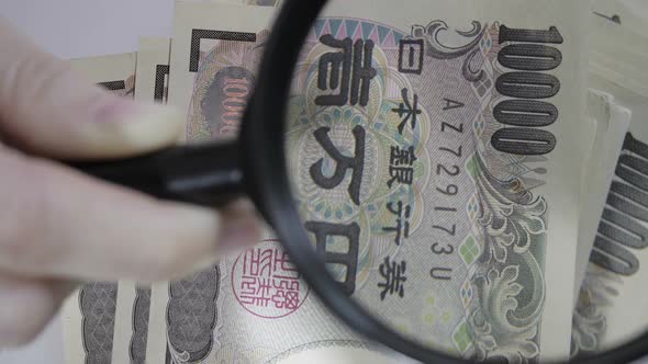 Financial Staff Inspection Money With Magnify Glass, Stock Footage