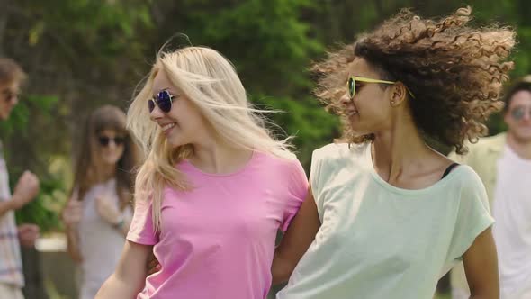 Two Best Friends Dancing, Enjoying Party With Friends in Park, Summer ...