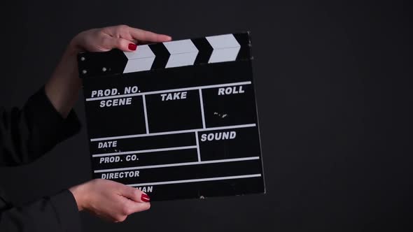 Clapper Board in Action on a Gray Background, Stock Footage | VideoHive