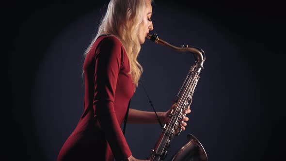 Woman Plays On Saxophone Jazz Melody, Stock Footage | VideoHive