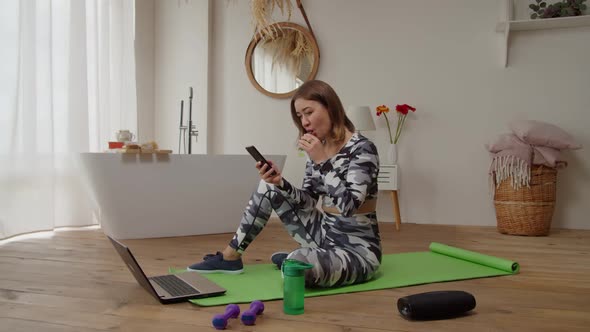 Positive Active Sporty Fitness Female Eating Protein Bar After Intense ...