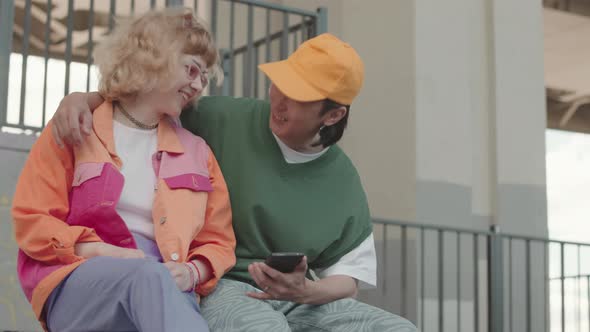 Multiethnic Y2K Couple Listening to Music Outdoors, Stock Footage ...