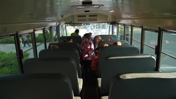 Happy Kids Taking Places in School Bus To Go Home, Stock Footage ...