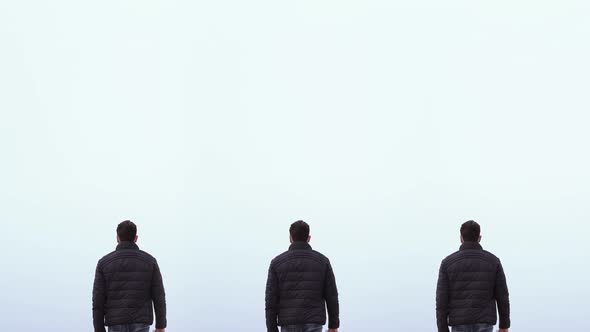 Three Men Walk with Their Backs, Stock Footage | VideoHive