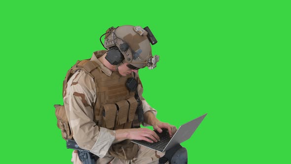 Soldier Using Laptop Computer for Surveillance During Military ...