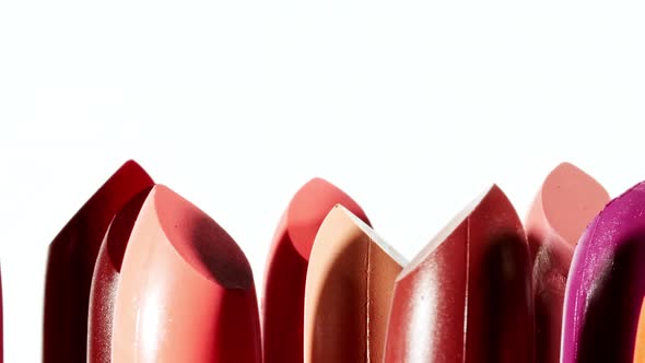 Colorful Lipstick Palette Rotation on White Background, Stock Footage