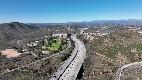 Aerial View of Highway with Traffic Surrounded By Mountain South ...