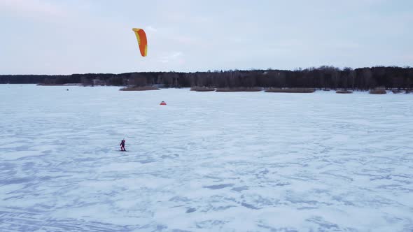 SnowKiting Kitesurfing Sport on the Ice Lake Winter, Stock Footage