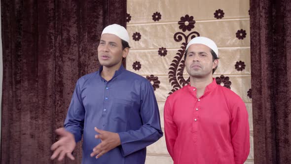 Two Muslim men talking to someone, Stock Footage | VideoHive
