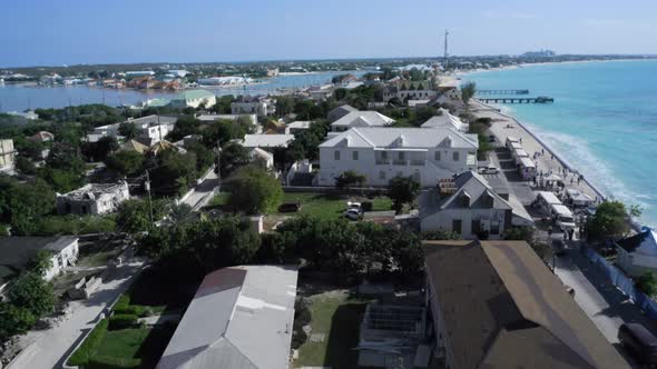 Aerial footage of houses and bay in Cockburn Town, Grand Turk, Turks ...