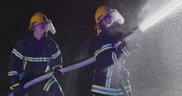 Night Shift of Firefighters Extinguishing the Blaze, Stock Footage