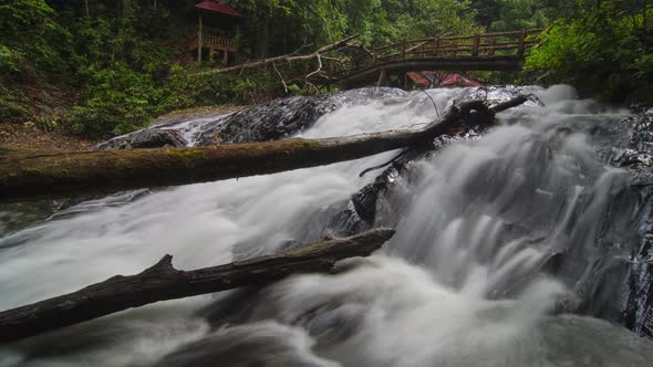 Waterfall at Bukit Hijau, Kedah with bridge., Stock Footage | VideoHive