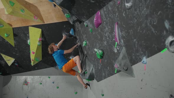 Slow Motion Young Climbers Training on a Climbing Wall Man and Female ...